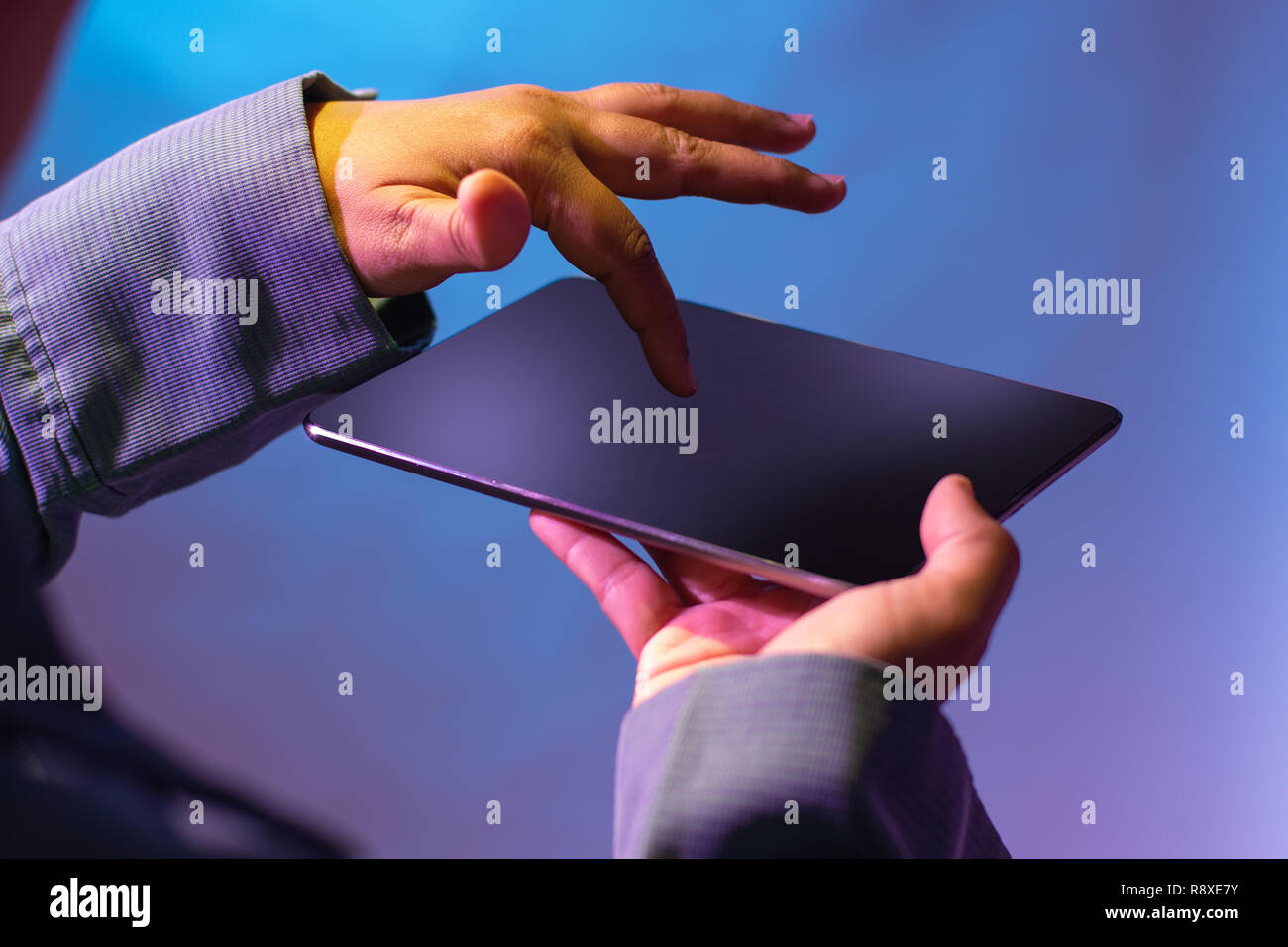 Pointing finger onto upward position digital tablet. Business and ...