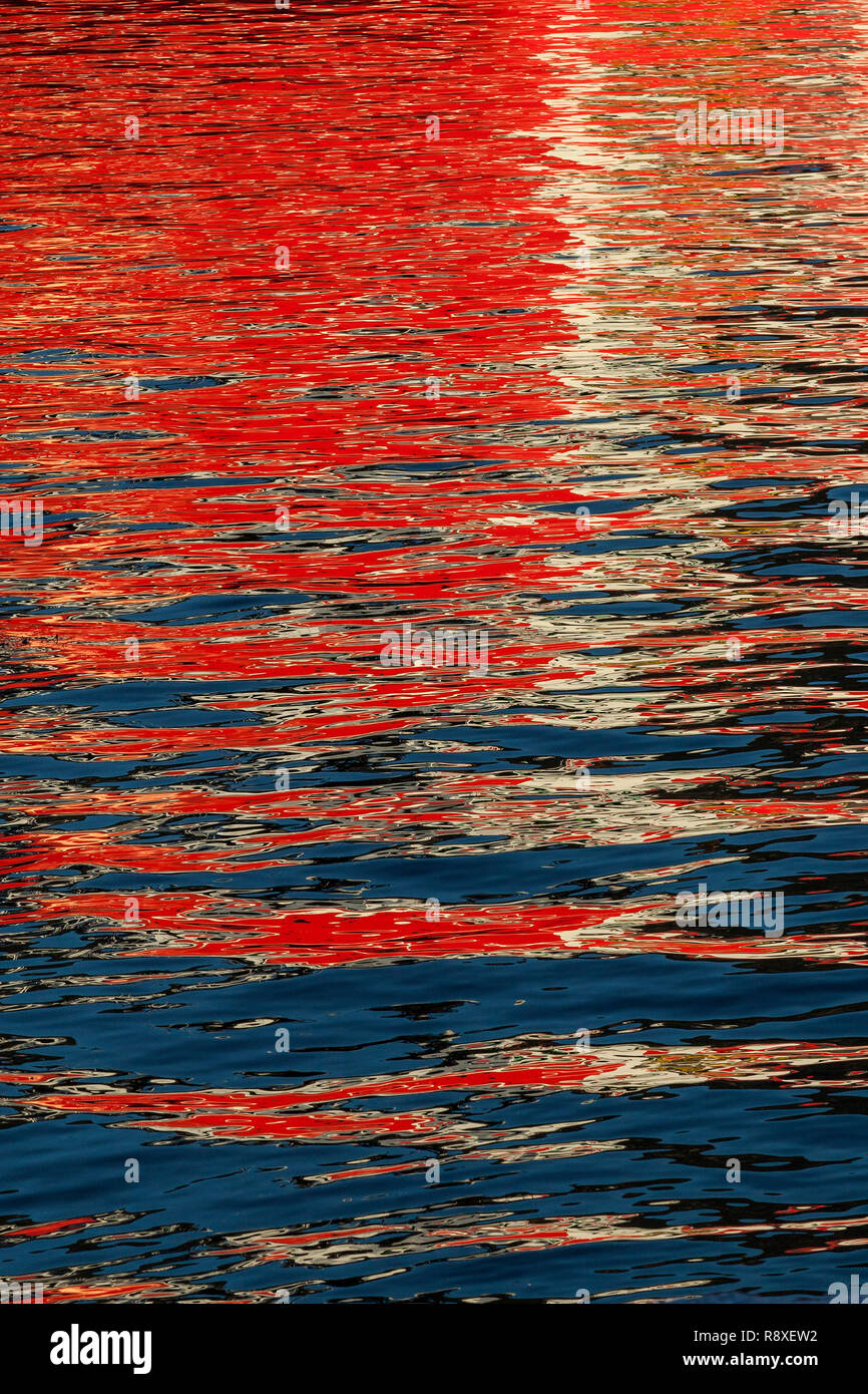 Reflections from a ship throwing interesting patterns on the water ...