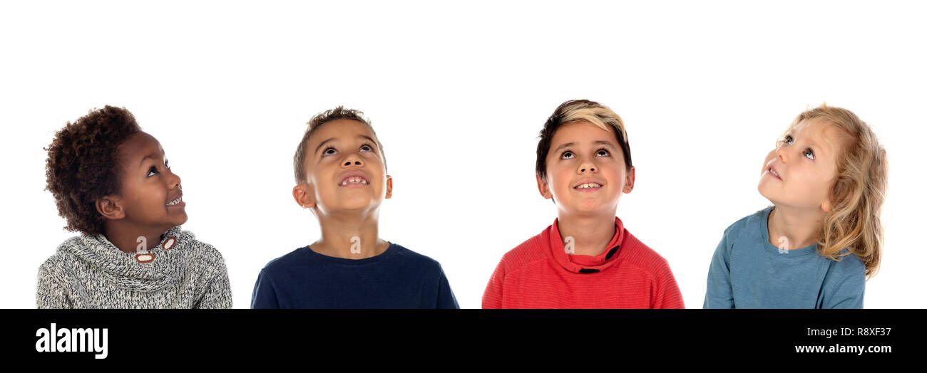 Four happy children looking up isolated on a white backround Stock ...