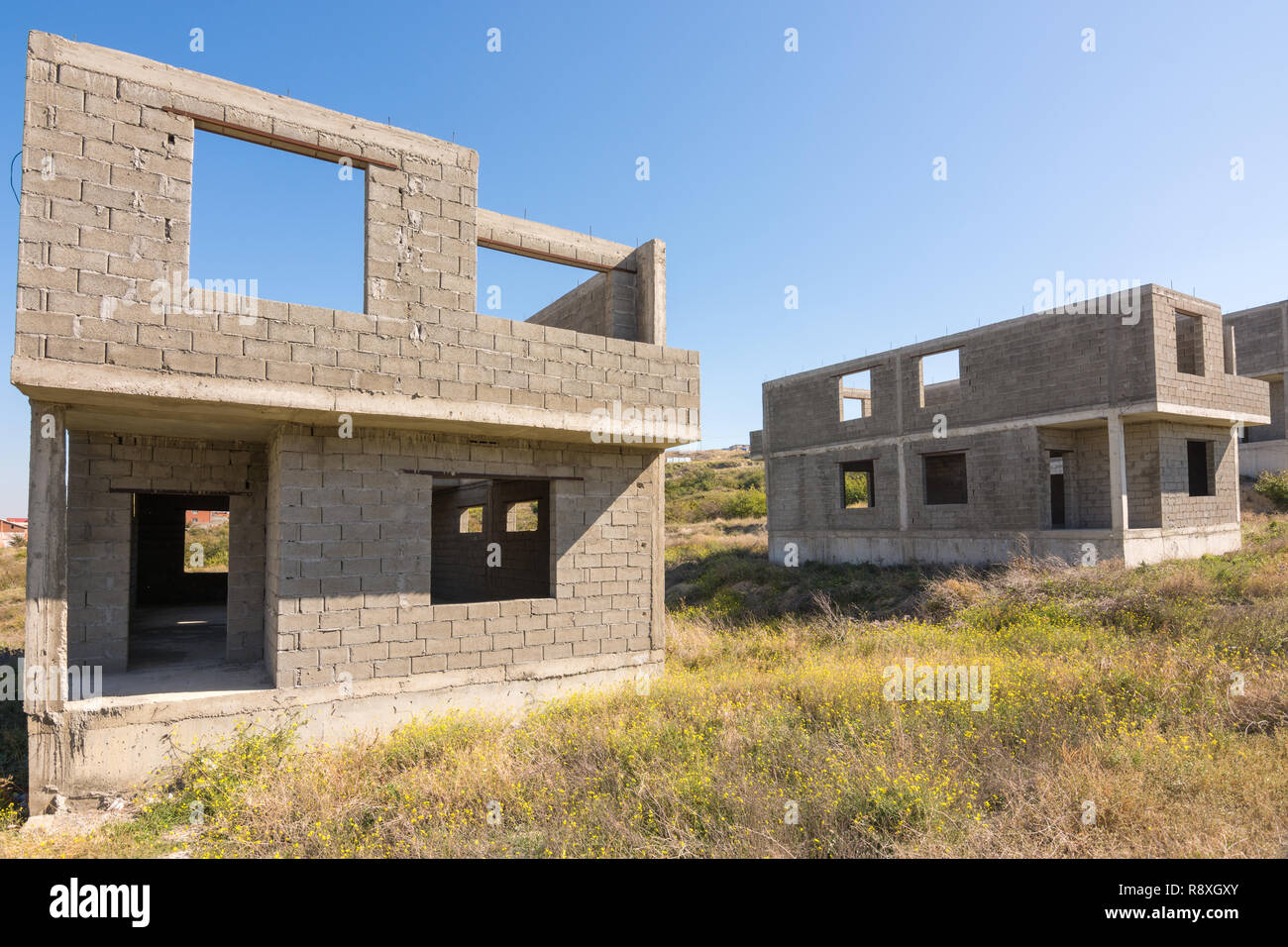 Abandoned unfinished country houses Stock Photo - Alamy