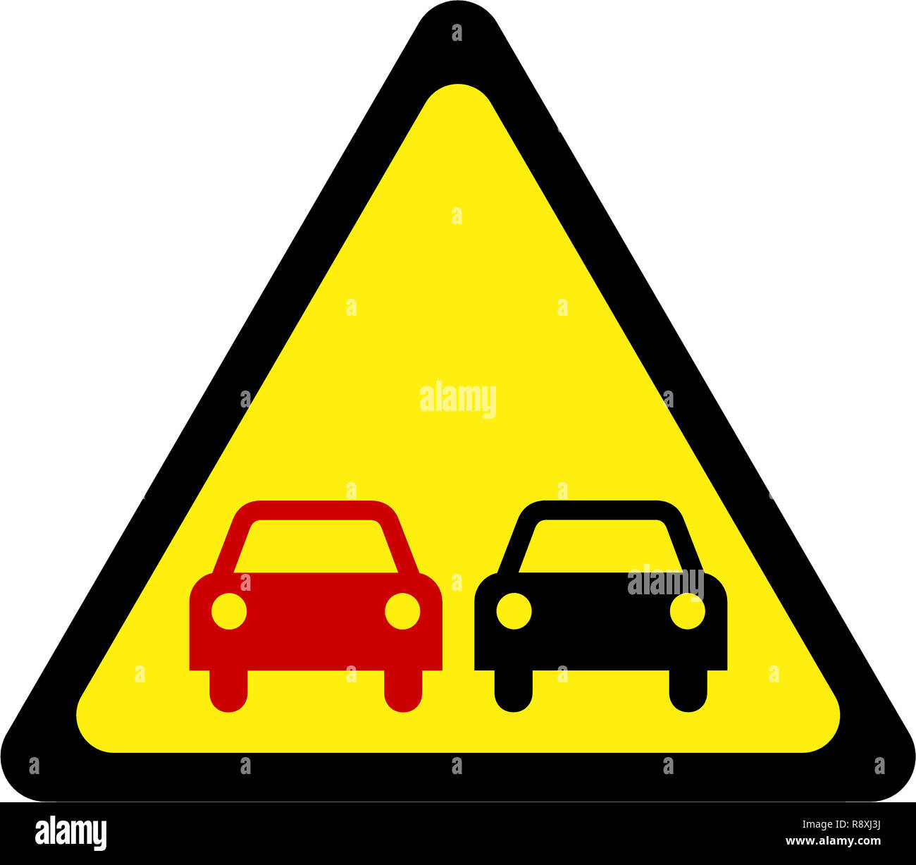 Warning sign with overtaking symbol Stock Photo - Alamy