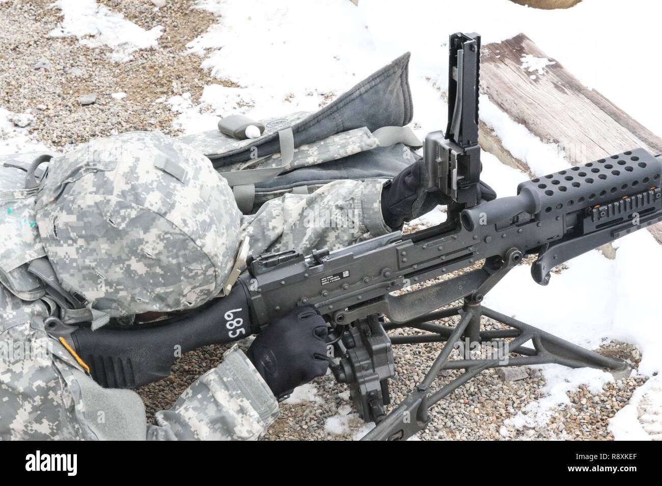 A U.S. Army Reserve Soldier awaits a safety to clear her weapon while ...
