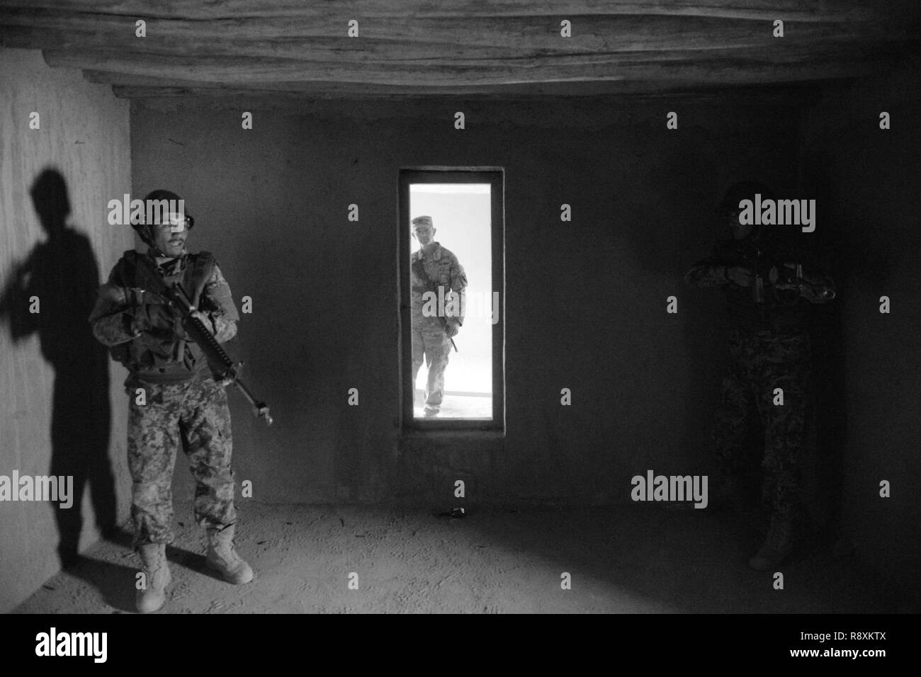 Sgt. 1st Class Michael Smithee of the 101st Airborne Division, peers ...