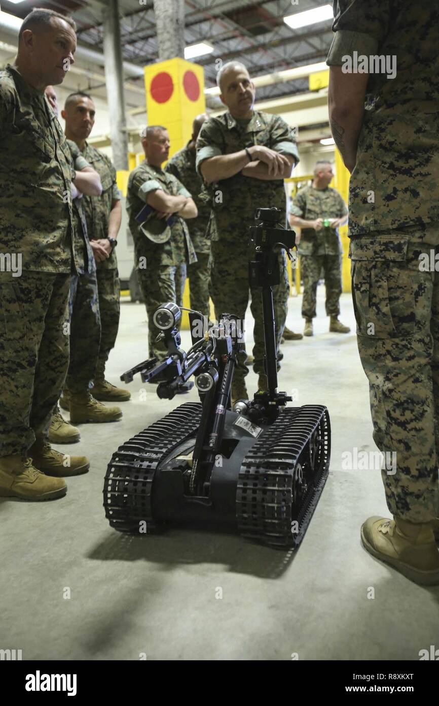 Lieutenant Gen. Michael Dana watches a demonstration of an Explosive ...