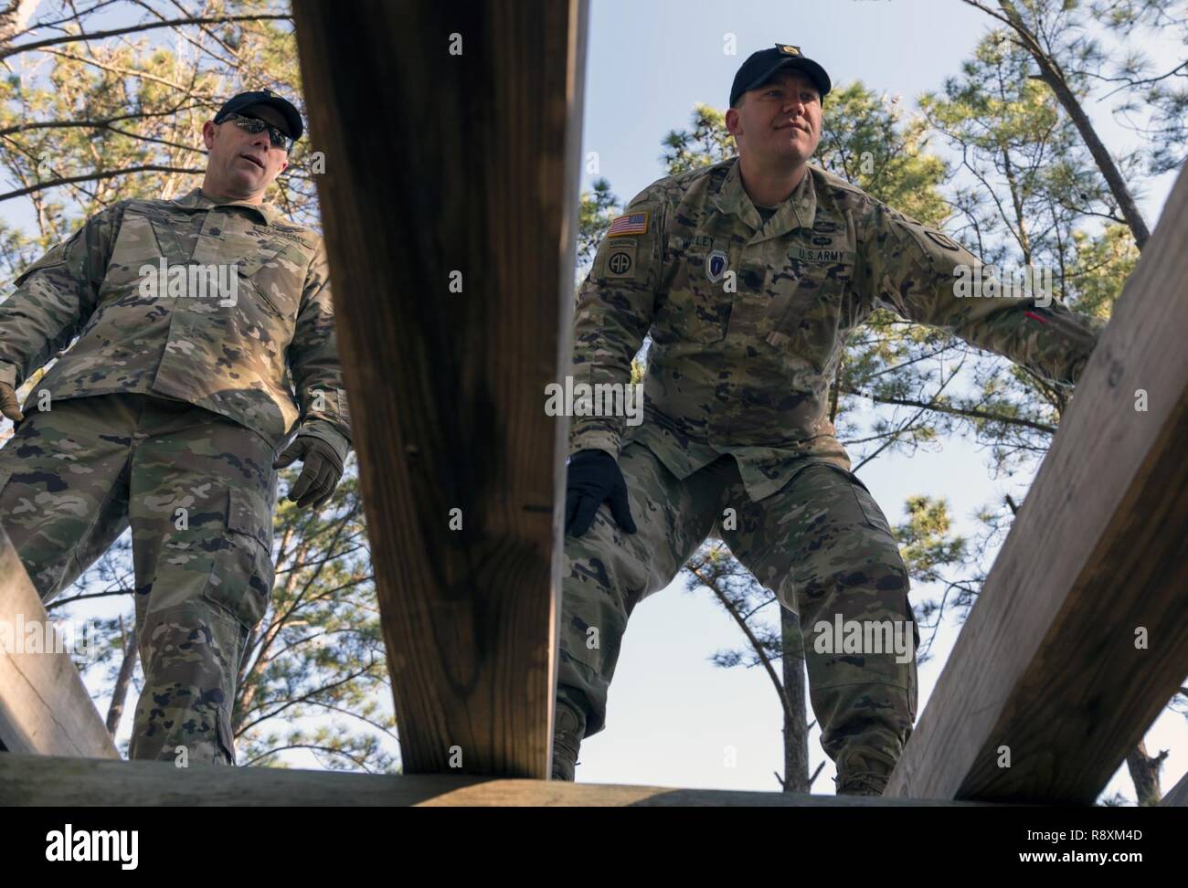 Command Sgt. Maj. Lawrence Ogle (Left) and Army Staff Sgt. Adam Whitley ...