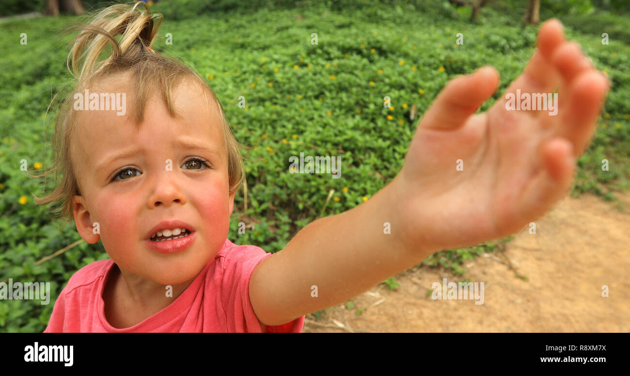 Boy looks high in the sky Stock Photo - Alamy