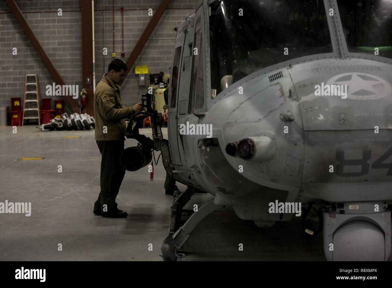 U.S. Marine Corps Lance Cpl. Mathew Glora, a crew chief with Marine ...