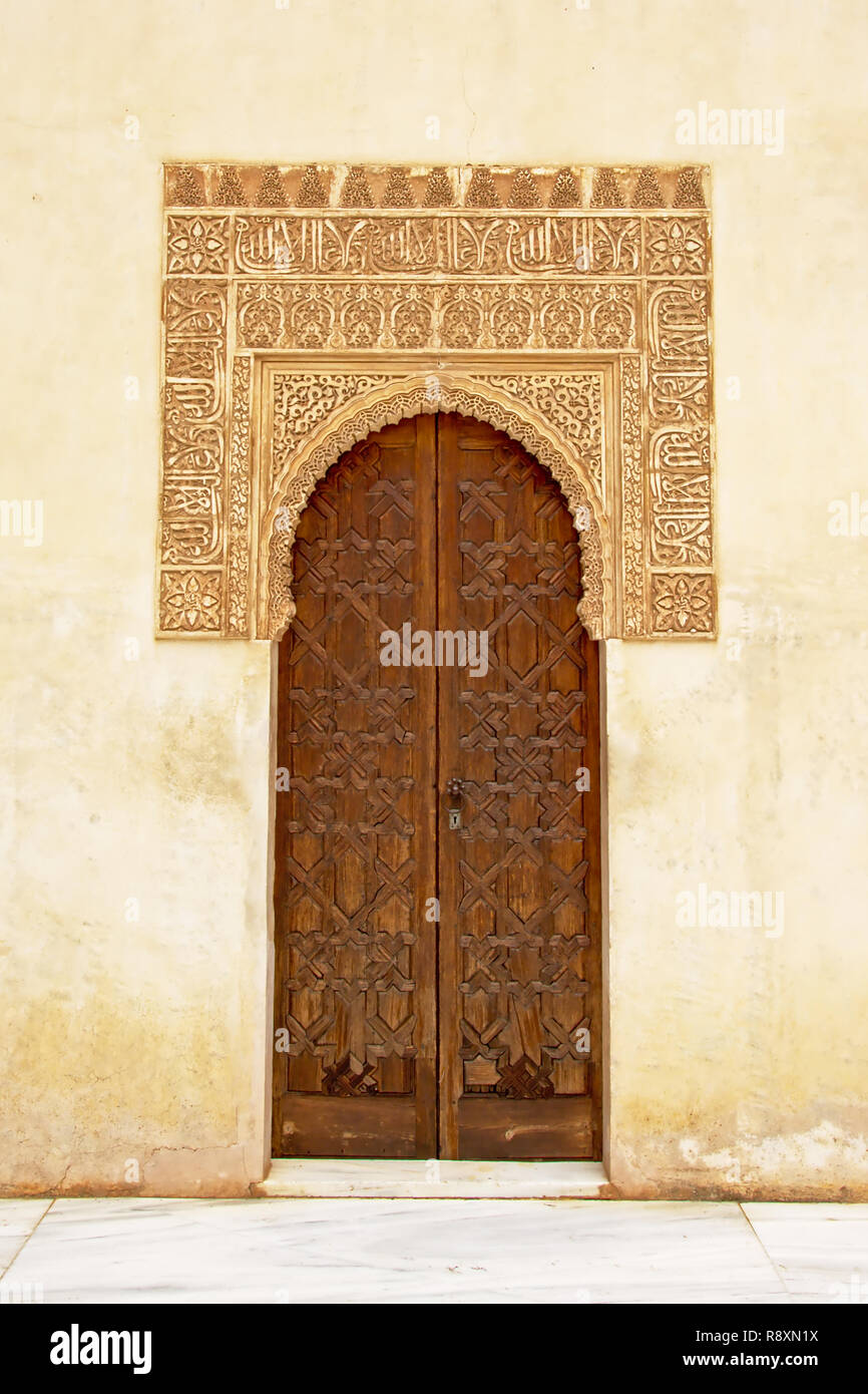 Door with decorative wood and stone carving of Nasrid Palace , Alhambra ...