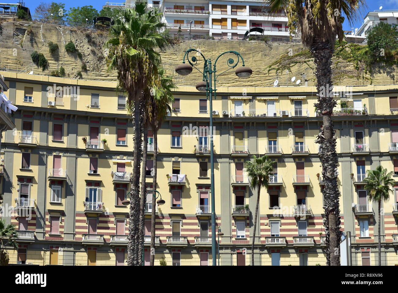 Traditional Mediterranean apartment building with high ceilings and ...