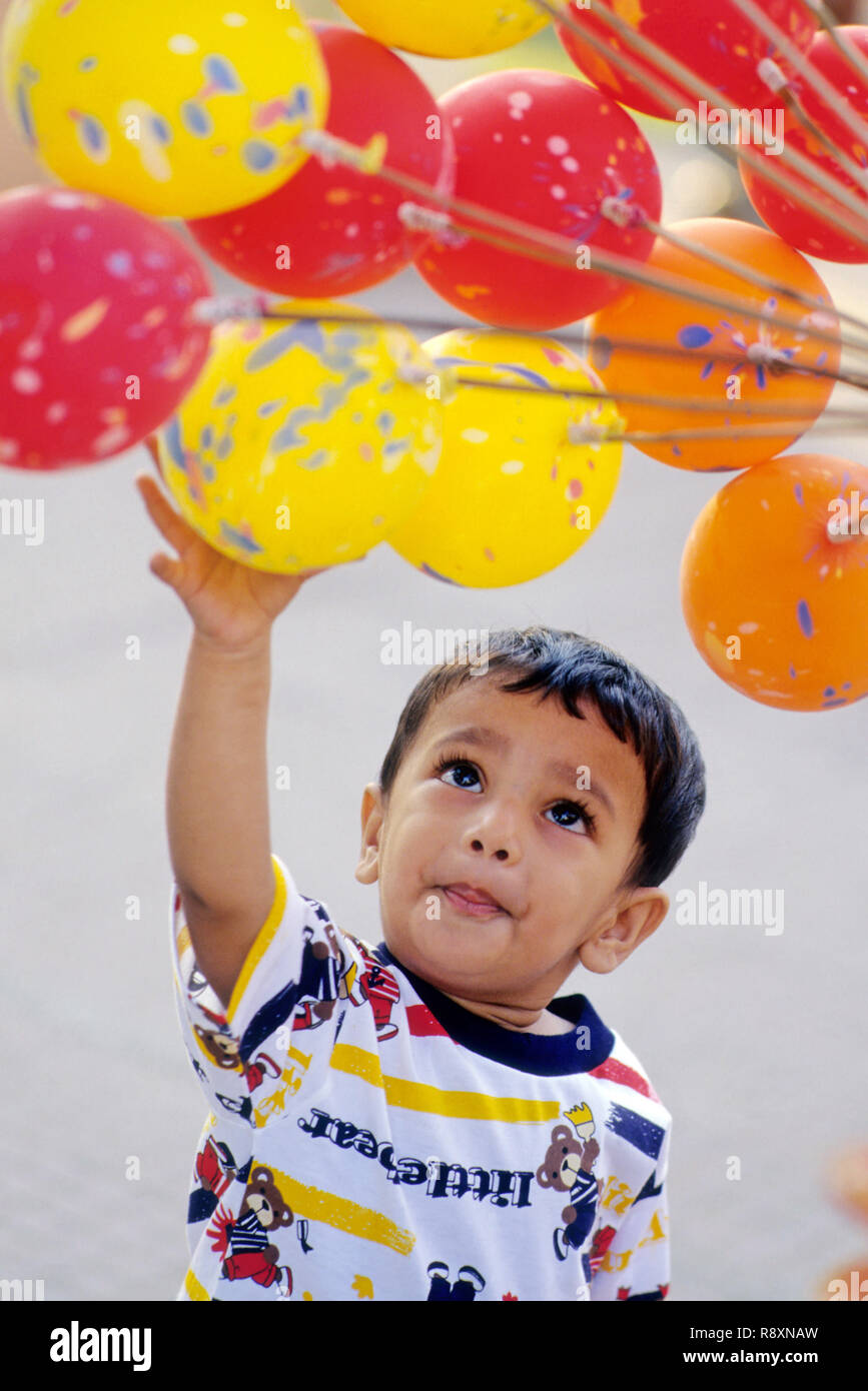 Balloons with happy faces and hand hi-res stock photography and images ...