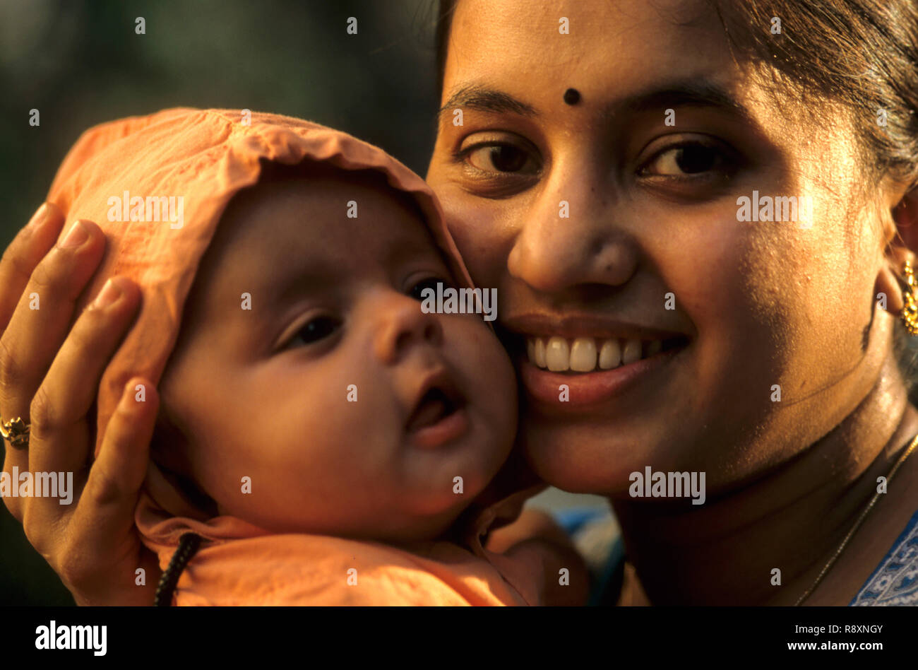 Mother Touching Baby Cheek High Resolution Stock Photography and Images ...