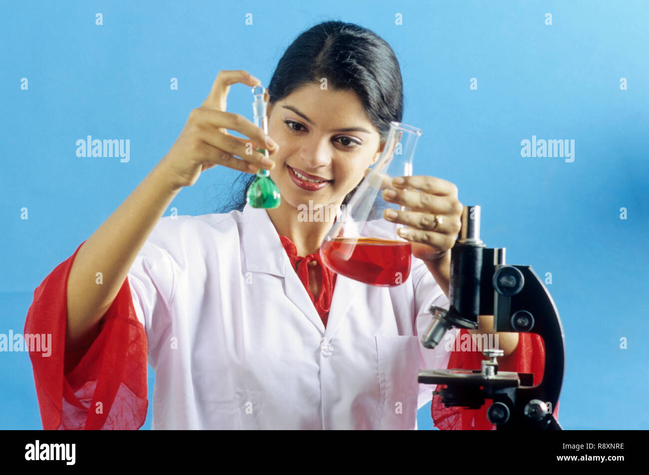 Indian Girl in Lab holding Chemical Flask MR.NO.579 Stock Photo - Alamy
