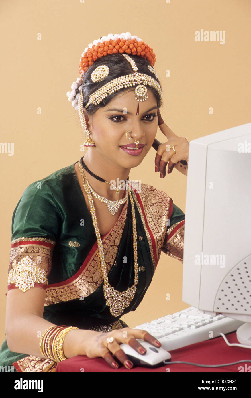 classical dancer operating computer, india, MR. NO. 579 Stock Photo - Alamy