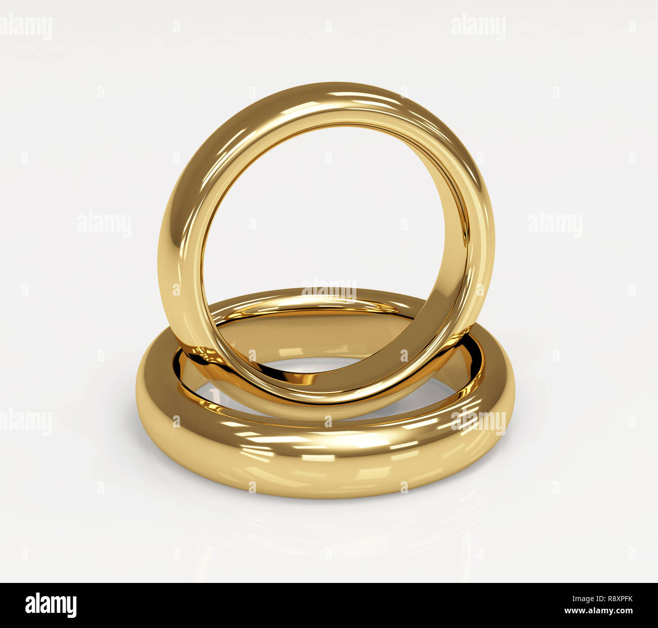 Two 3d gold wedding ring. Objects over white Stock Photo - Alamy
