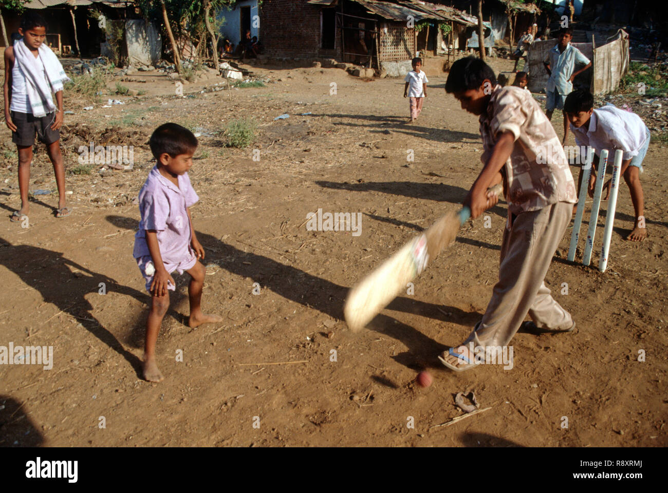 Children Kids Playing Cricket Stock Photo - Alamy