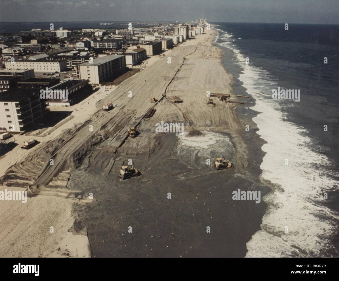 Sand is pumped onto the beach at Ocean City in 1991 as part of initial ...