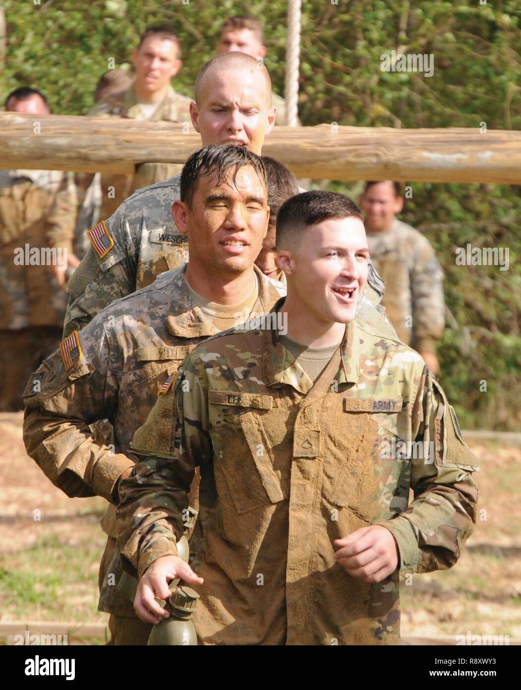 Soldiers maintain a positive attitude and military bearing while ...