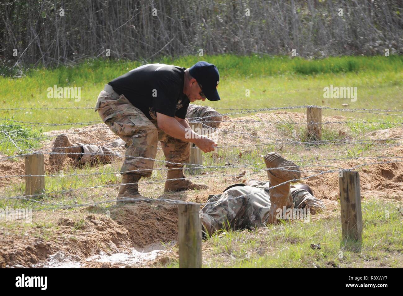 An Air Assault instructor makes machine gun and helicopter sounds at ...