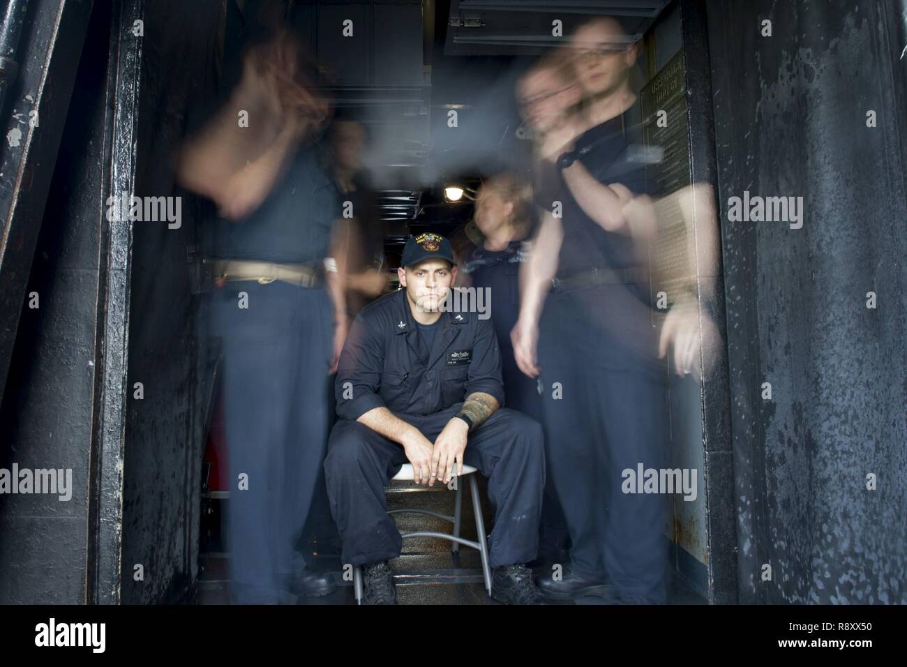ARABIAN GULF (Feb. 5, 2017) Gunner's Mate 2nd Class Ricky Henson has ...