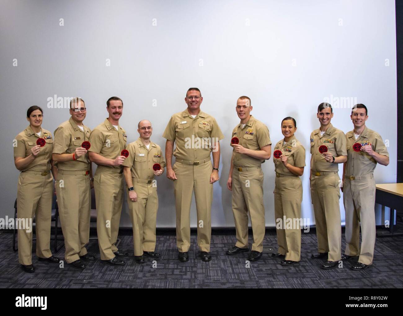 Rear Adm. Dave Welch, center, commander of Naval Surface and Mine ...