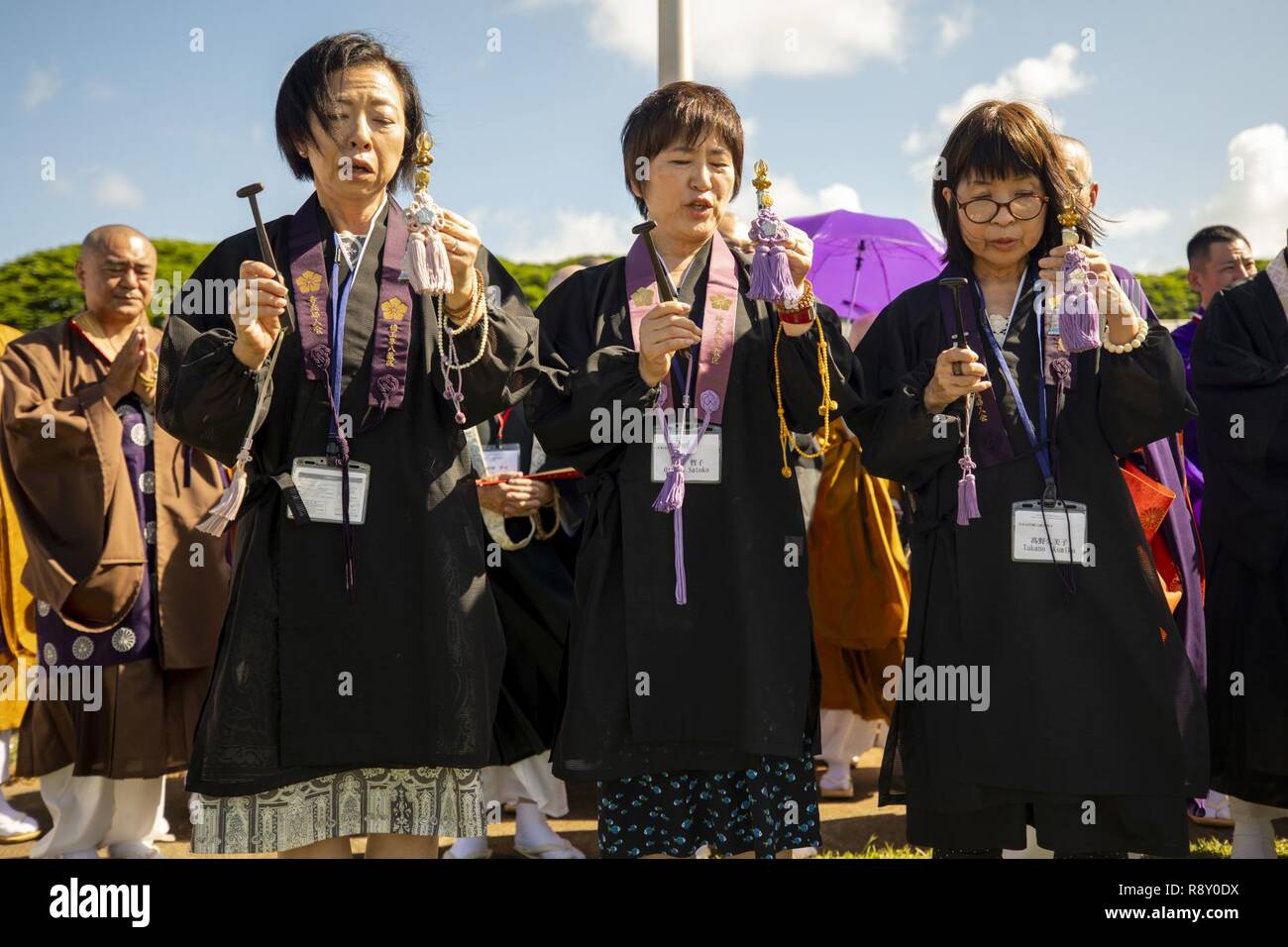 Members of the Japanese Religious Committee for World Federation sing a ...