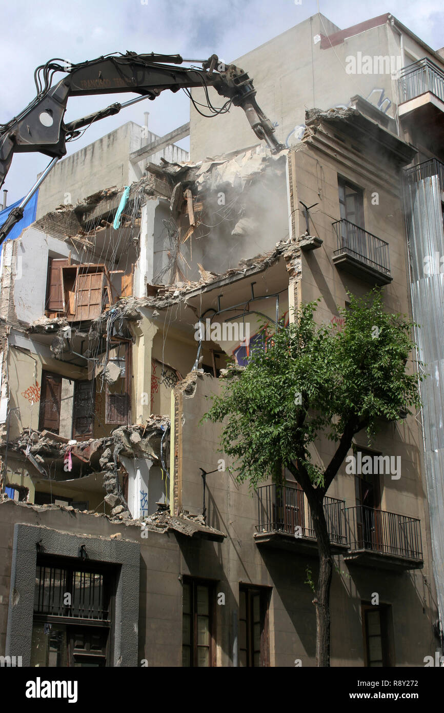old building demolition, backhoe demolishing a building, heavy ...