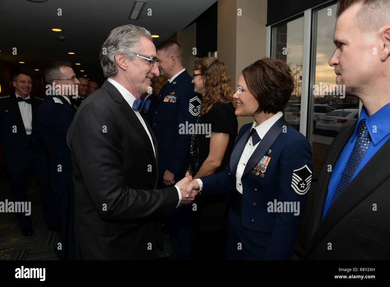 North Dakota Gov. Doug Burgum shakes hands with Master Sgt. Merri Jo ...