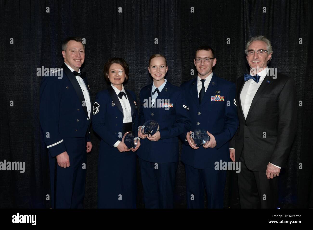 North Dakota Gov. Doug Burgum, far right, and Col. Britt Hatley, the ...