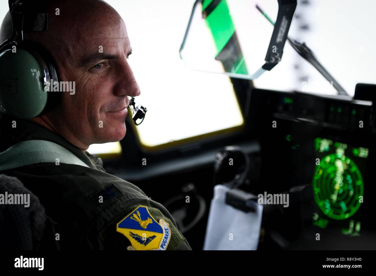 Col. Kenneth Moss, 374th Airlift Wing commander, flies over the Pacific ...