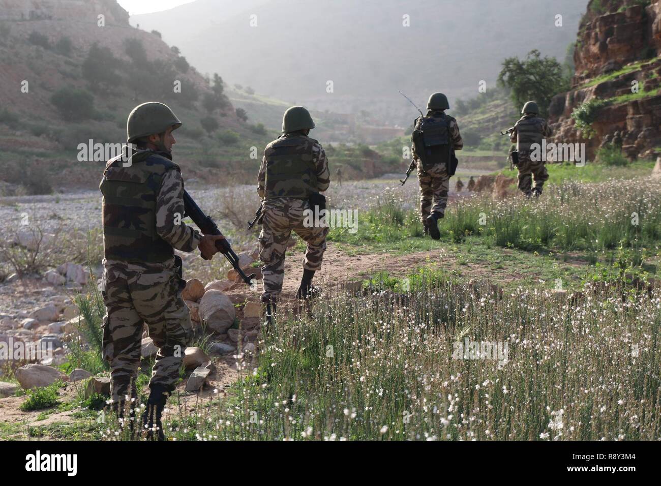 Members of the Moroccan Special Operations Forces advance towards the ...