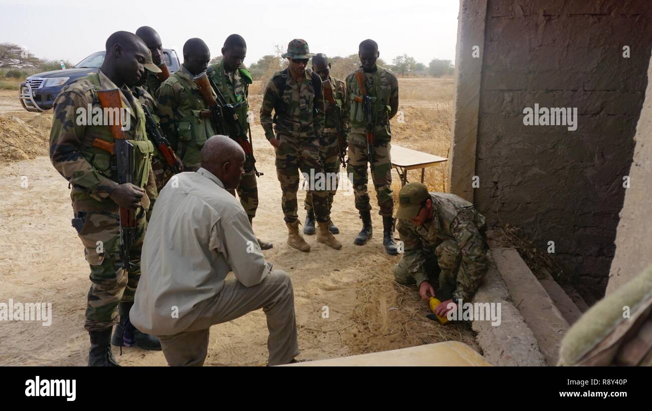 Nigerien service members observe as a U.S. Army Special Forces soldier ...