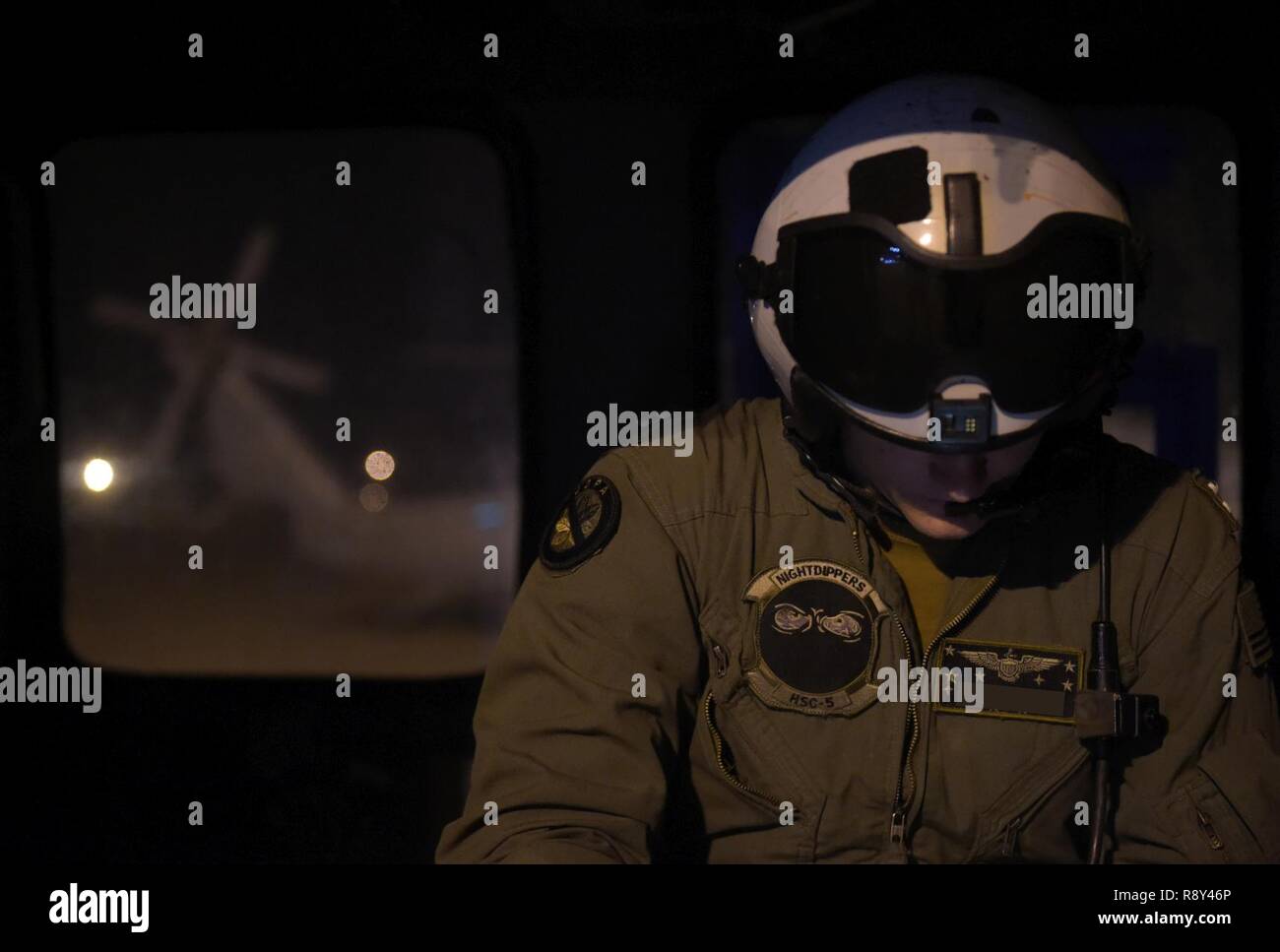 A U.S. Navy pilot assigned to Helicopter Sea Combat Squadron FIVE ...