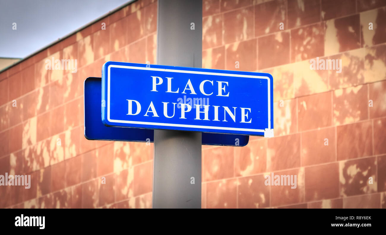 blue street sign where it is written in French Dauphine Square in ...