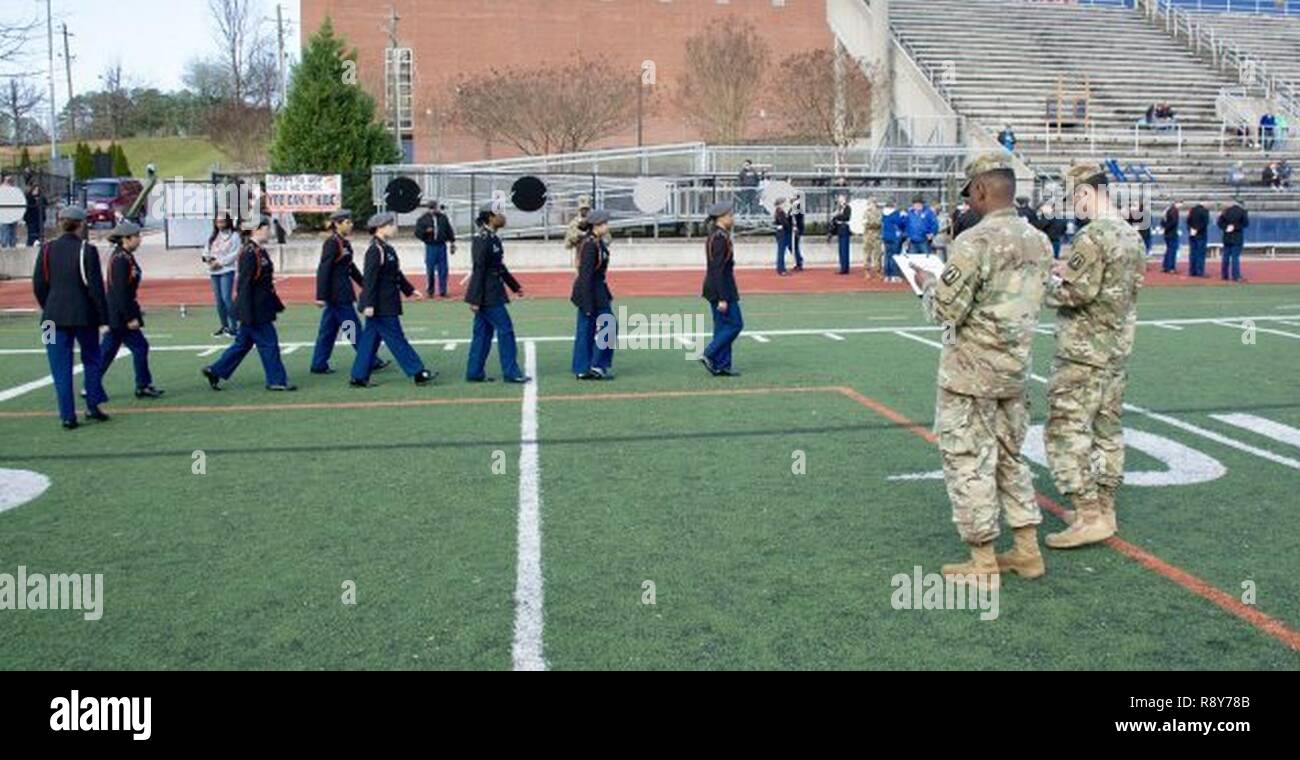 Two soldiers from the 335th Signal Command (Theater) grade an unarmed ...