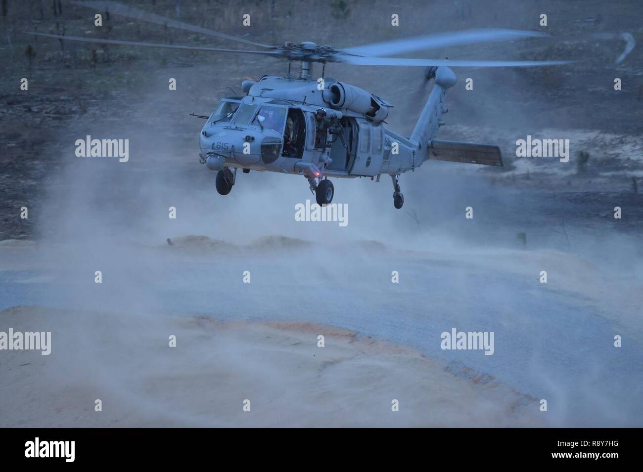 A U.S. Navy MH-60S Seahawk assigned to Helicopter Sea Combat Squadron ...