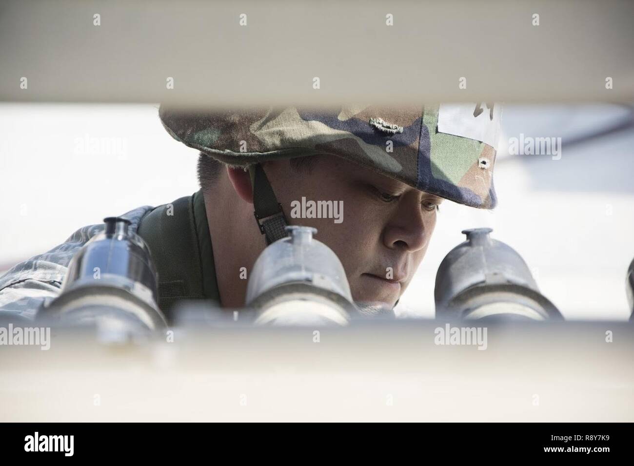 U.S Air Force Staff Sgt. Lloyd M. Loftis, a 624th Civil Engineer ...