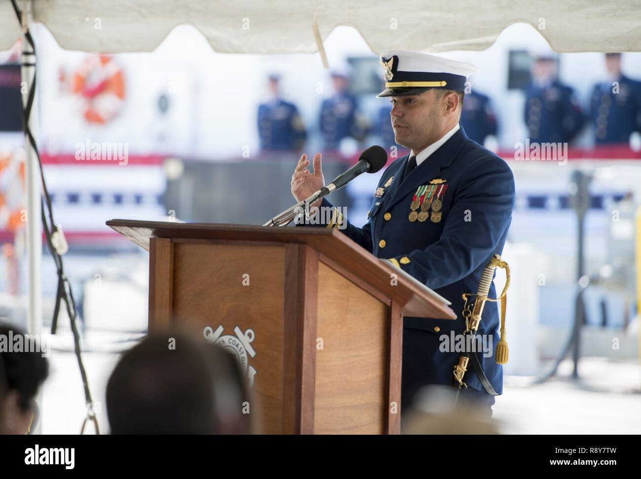 Lt. Mario Gil, commanding officer of Coast Guard Cutter cushing, speaks ...