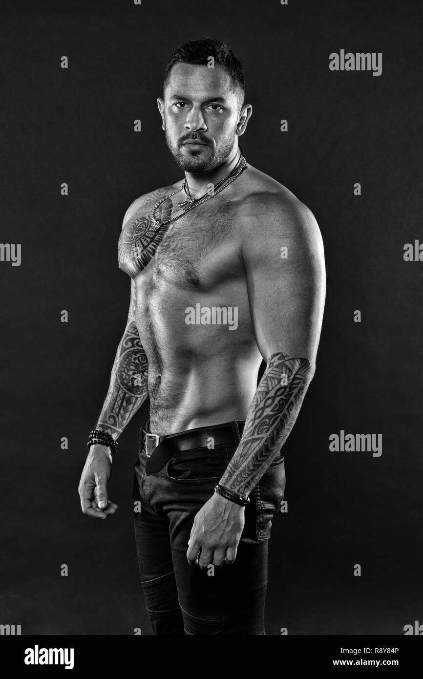 Bearded man show tattooed torso. Brutal strict macho with tattoos ...