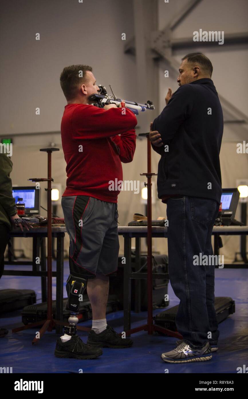 U.S. Marine Corps veteran John Flores, right, a 2017 Marine Corps ...