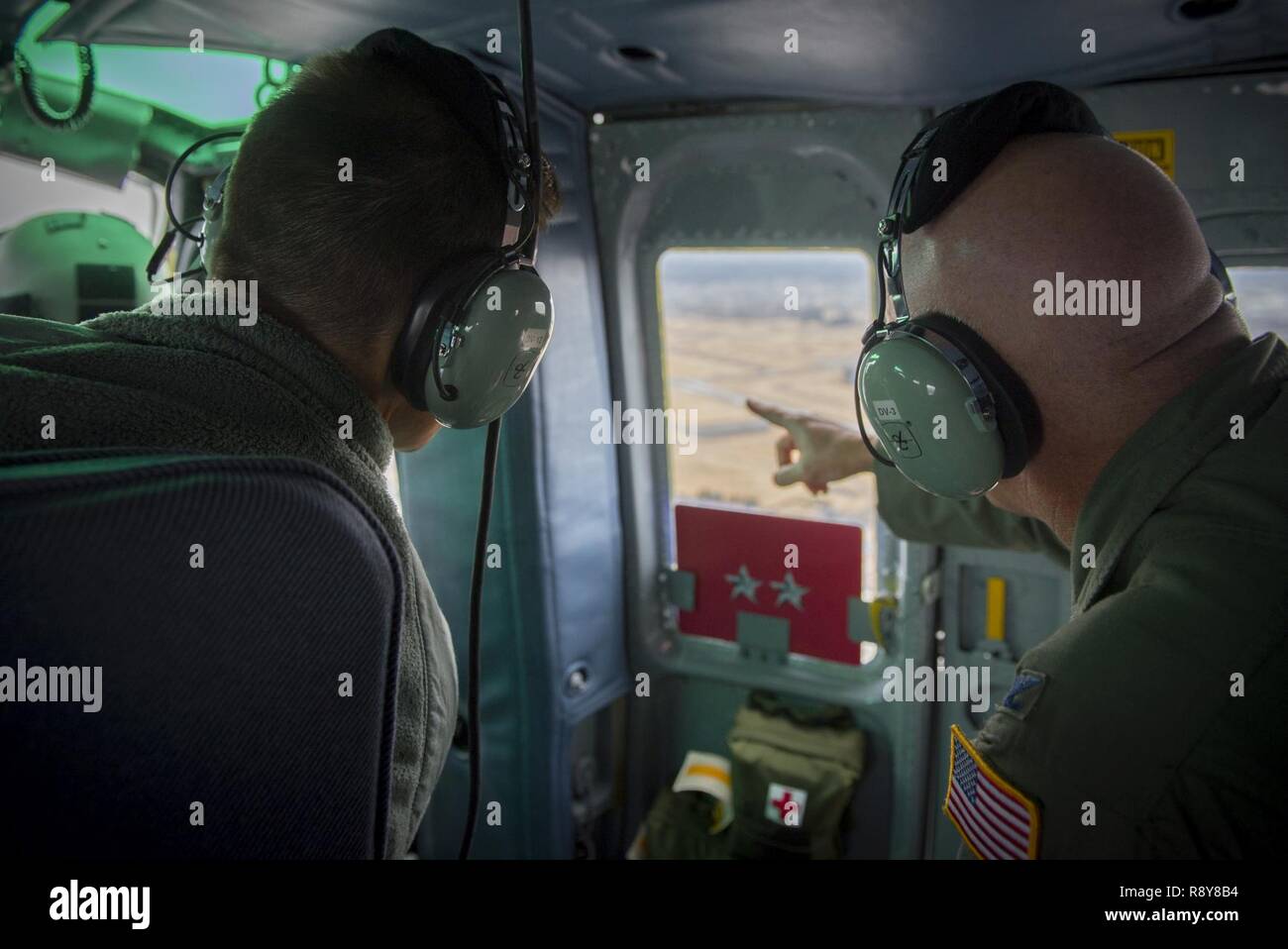 Col. Kenneth Moss, 374th Airlift Wing commander, points out Yokota land ...