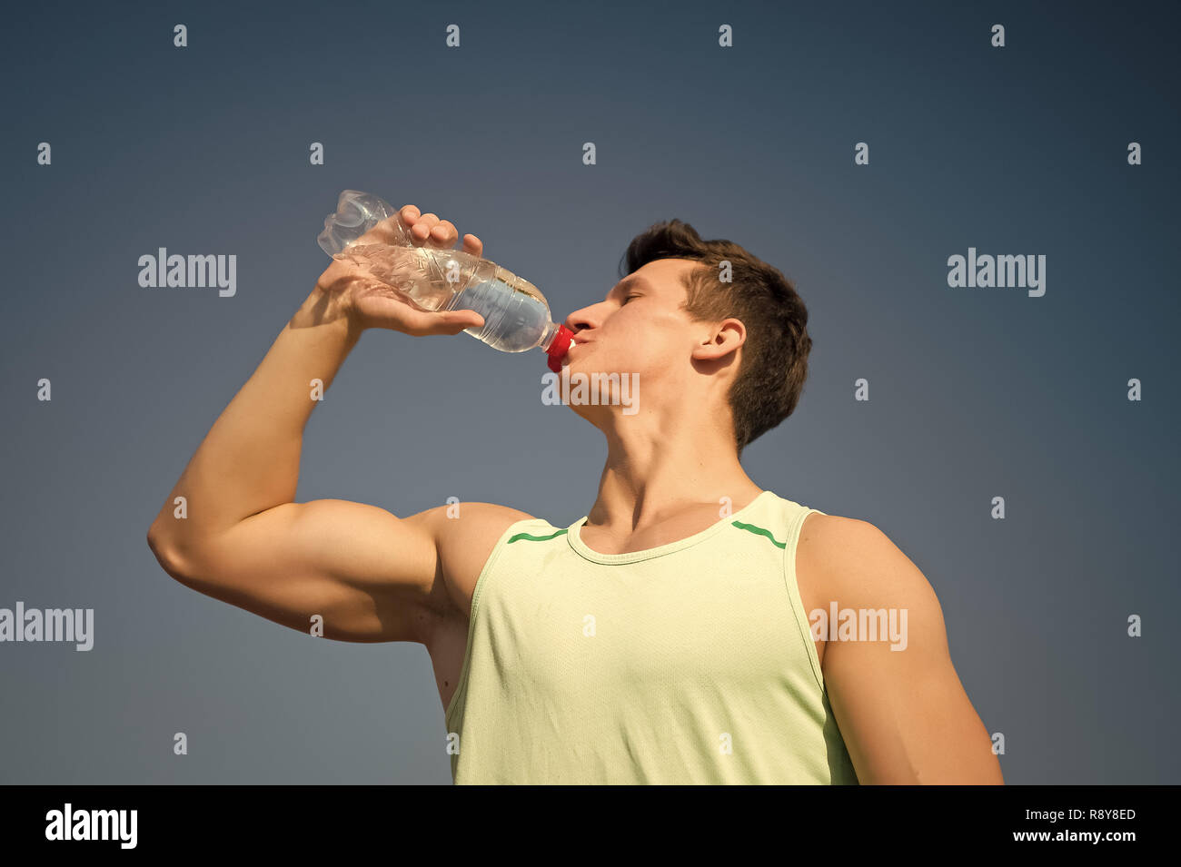 Bodybuilder with muscular hands muscles biceps, triceps. Athlete in ...