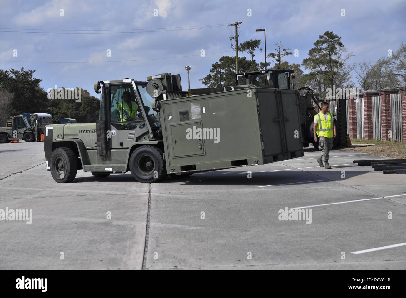 Airmen from the 437th Aerial Port Squadron position cargo at the Cargo ...