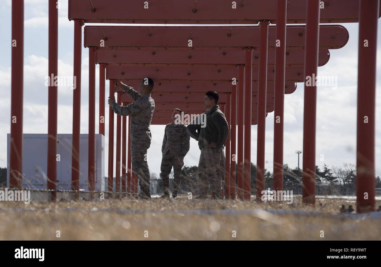U.S. Air Force Airmen with the 35th Operations Support Squadron ...