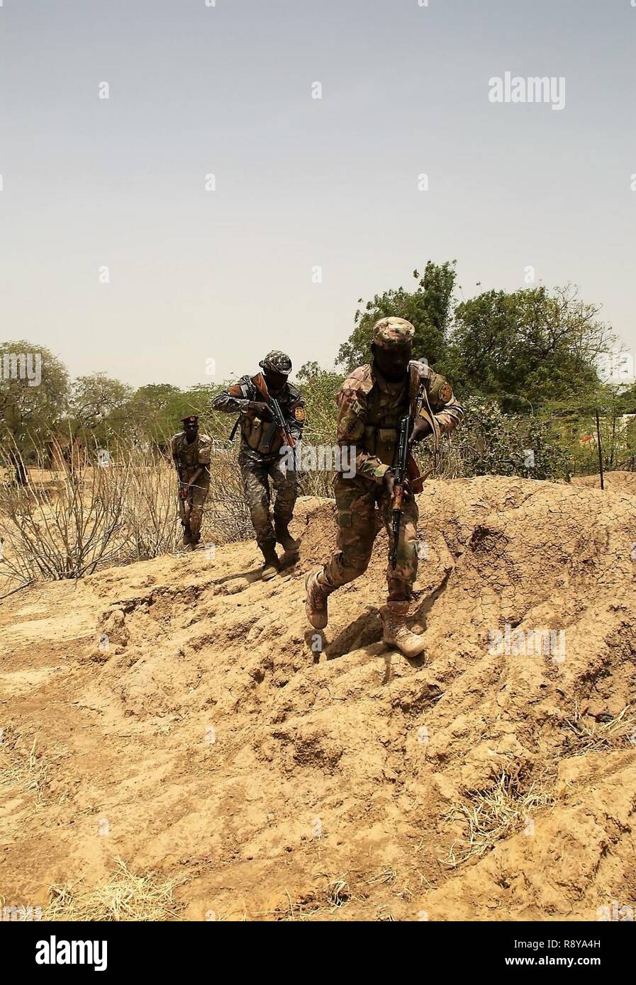 Chadian Soldiers secure a building and its perimeter during a beach ...