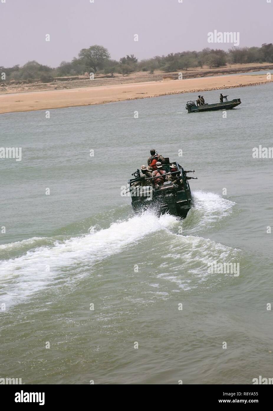 Chadian Soldiers conduct a beach infiltration training exercise as part ...
