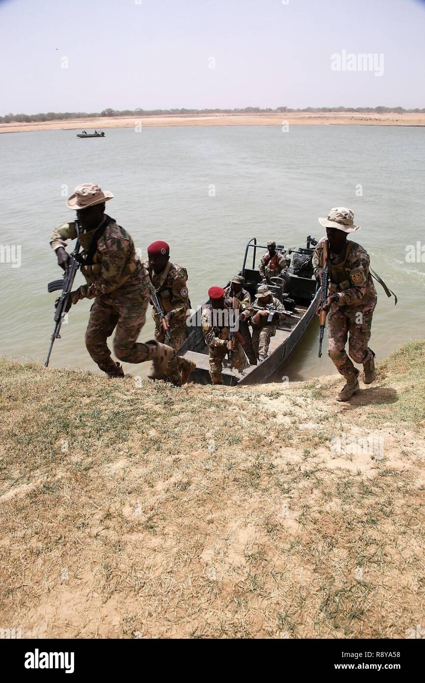 Chadian Soldiers conduct a beach infiltration training exercise as part ...