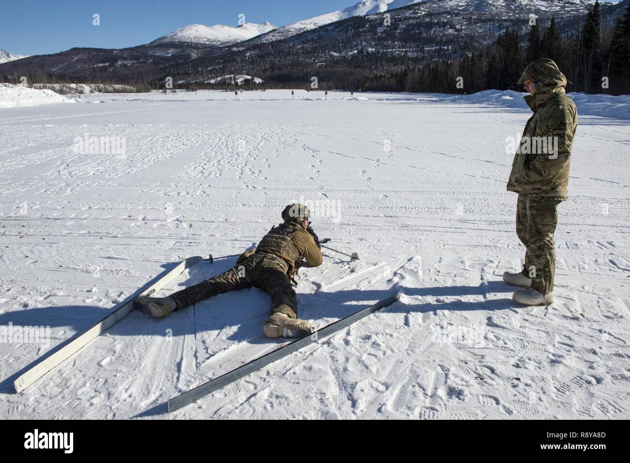 U.S. Air Force Staff Sgt. Patrick Twigg, right, coaches Senior Airman ...
