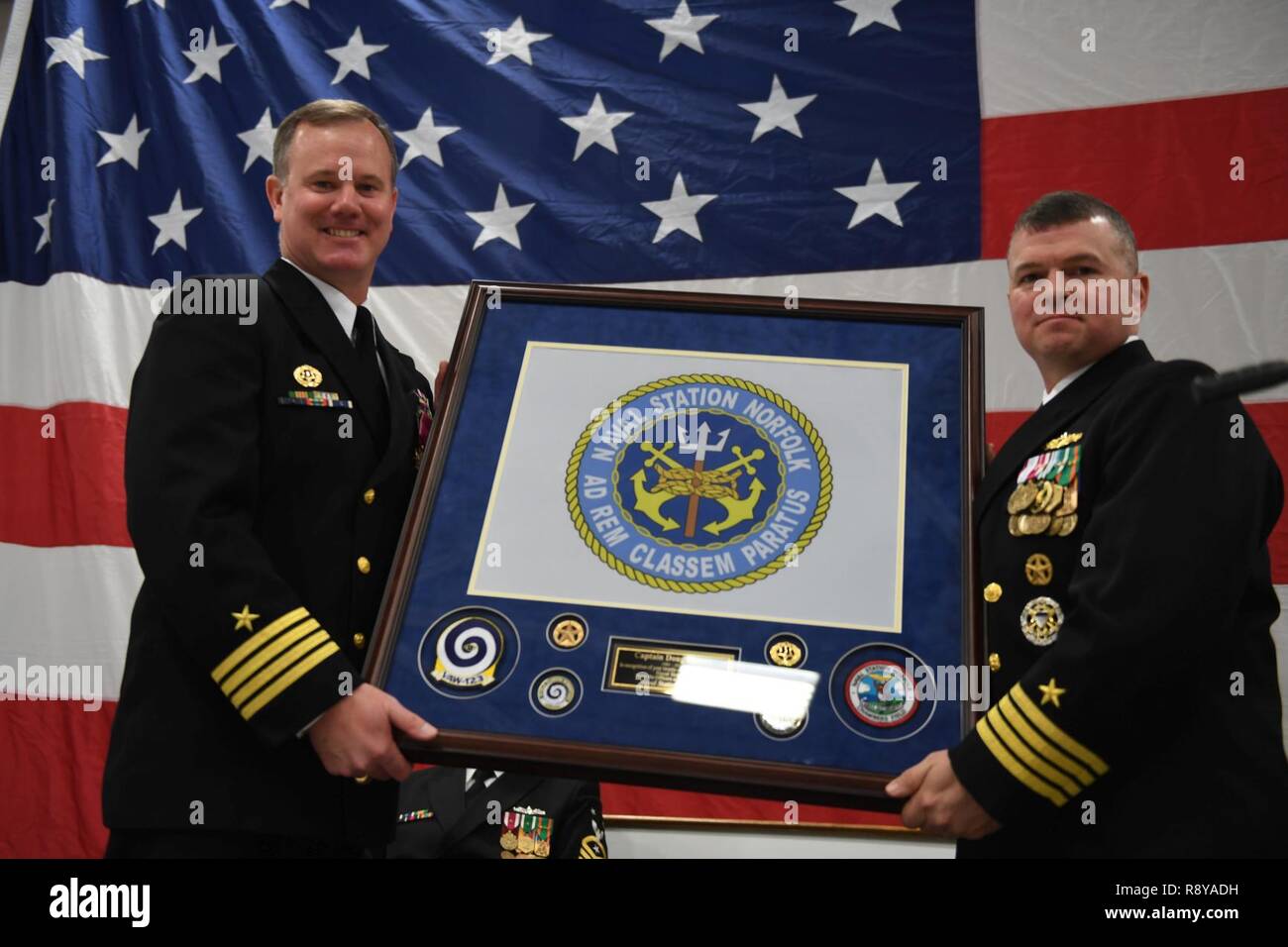 NORFOLK, Va. (March 10, 2017) - Capt. Douglas Beaver, left, former ...