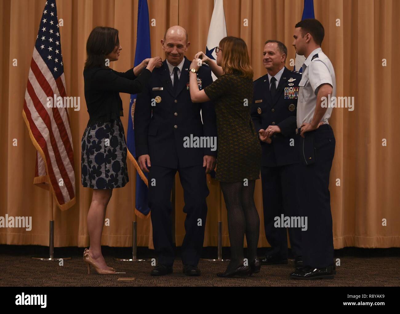 The Holmes family pins the rank of general on U.S. Air Force General ...