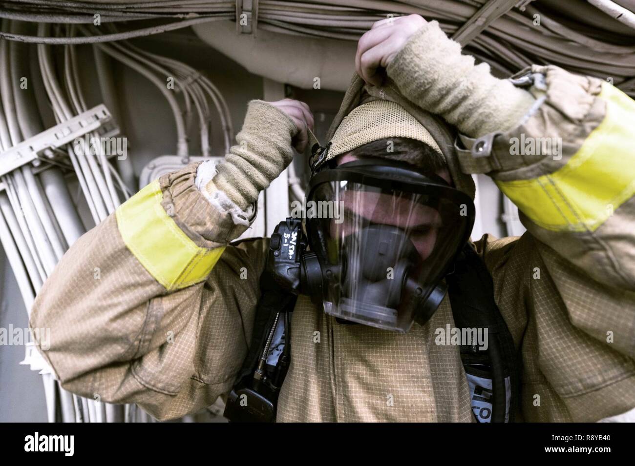 EAST CHINA SEA (March 9, 2017) Fireman Tyler Martin, from Perrin, Texas ...